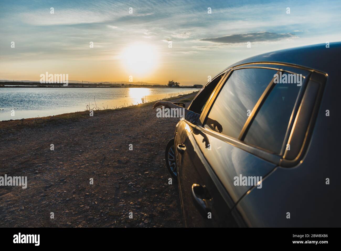 Car at a sunset hi-res stock photography and images - Alamy