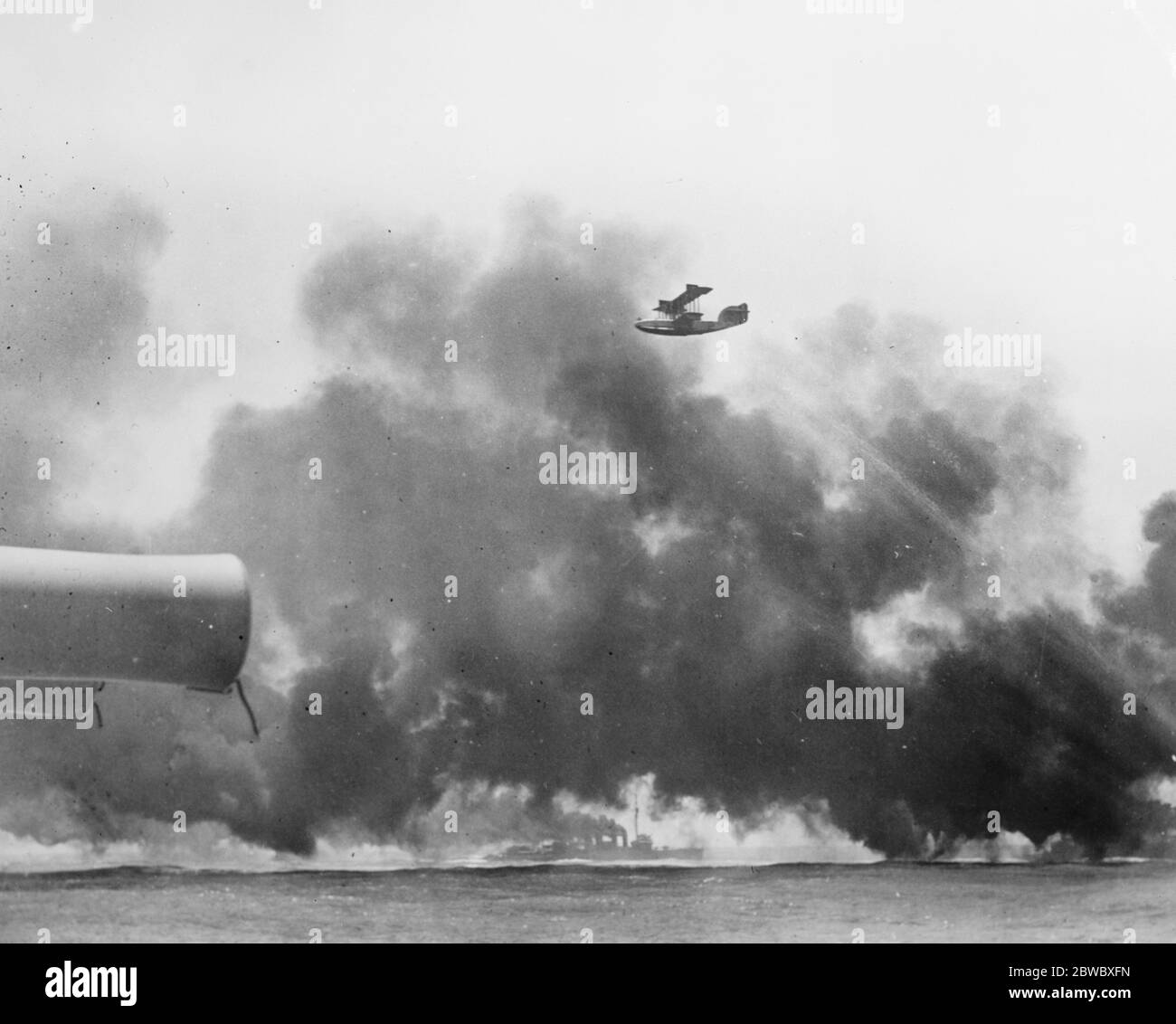Spectacular scene showing destroyers laying a smoke screen . Destroyers ...