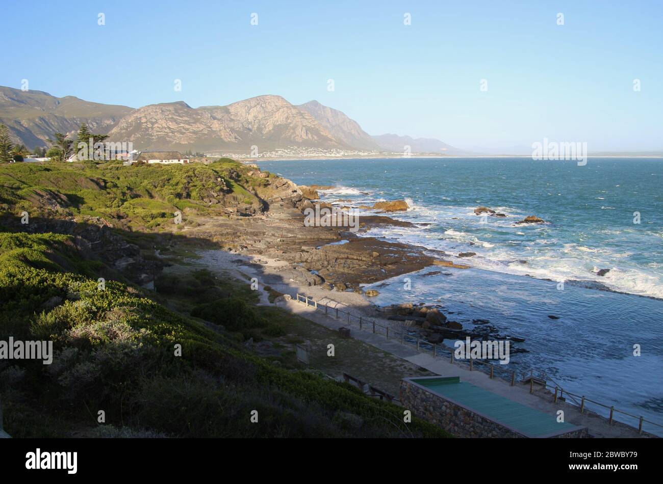 On the coast of Hermanus, South Africa. View of the wild Indian Ocean ...