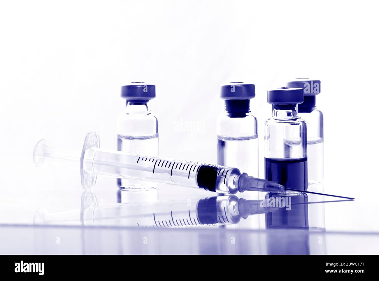 Family and syringe for healthy family. Vaccination and healtcare ...