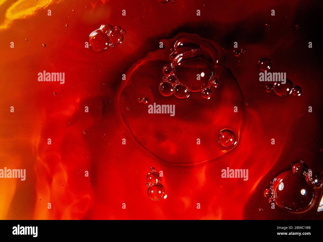 red liquid. Mixing colors in the water Stock Photo - Alamy