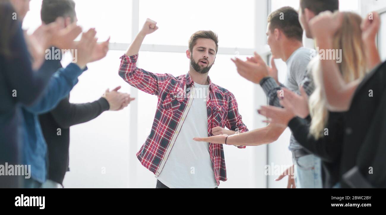 Business team congratulating leader hi-res stock photography and images ...