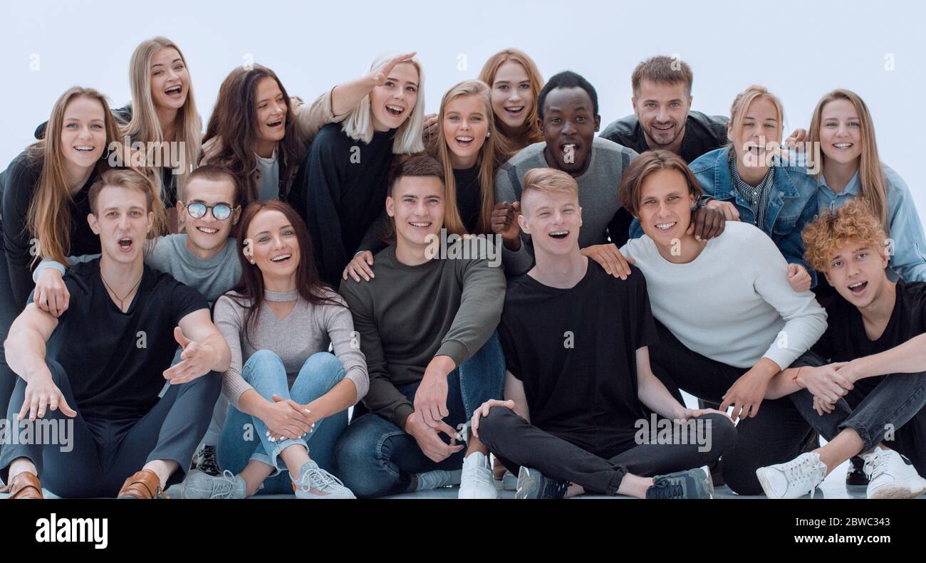 in full growth. a large group of friends gathered together Stock Photo ...