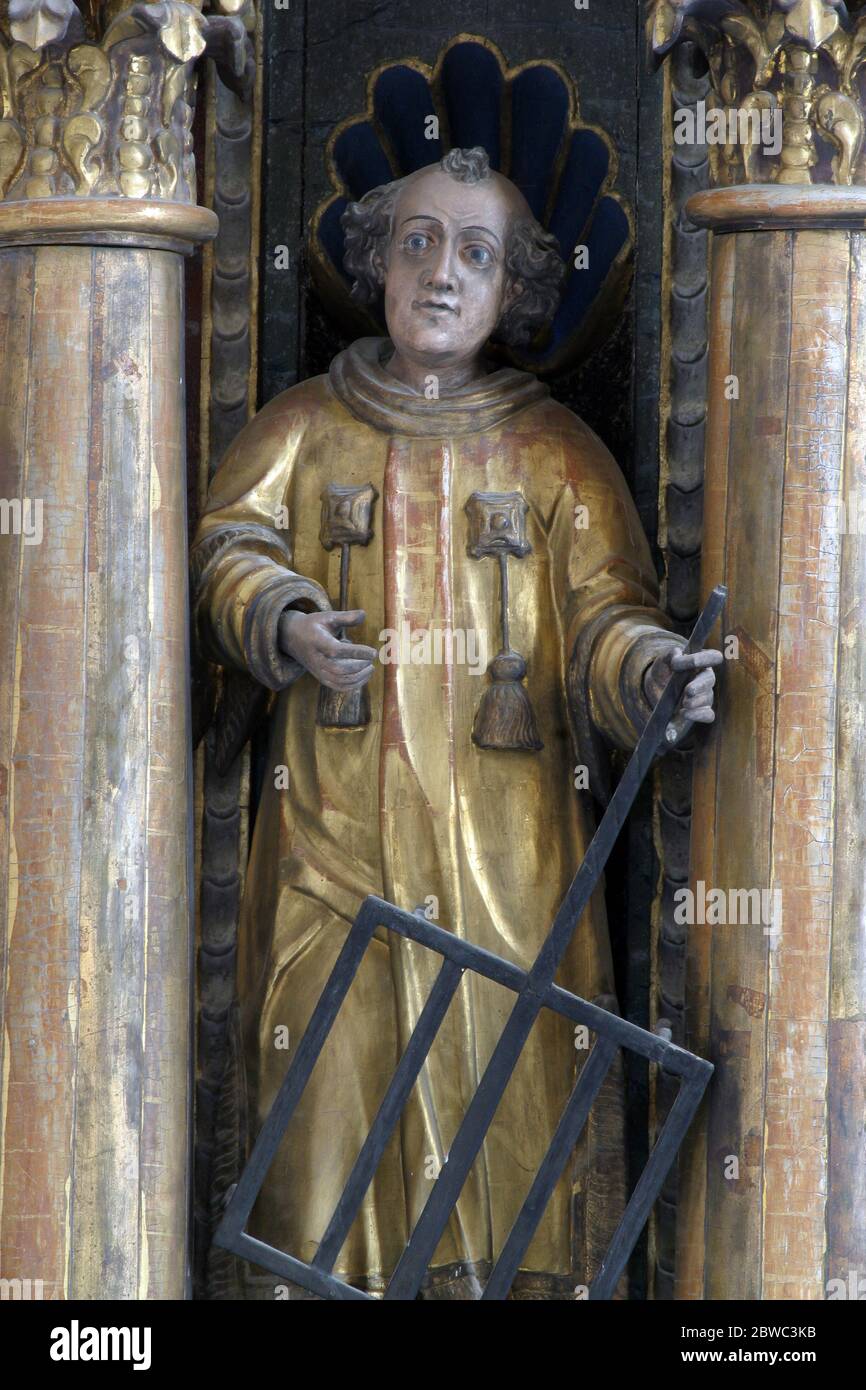 Saint Lawrence statue on a high altar at Our Lady of the Mountain ...