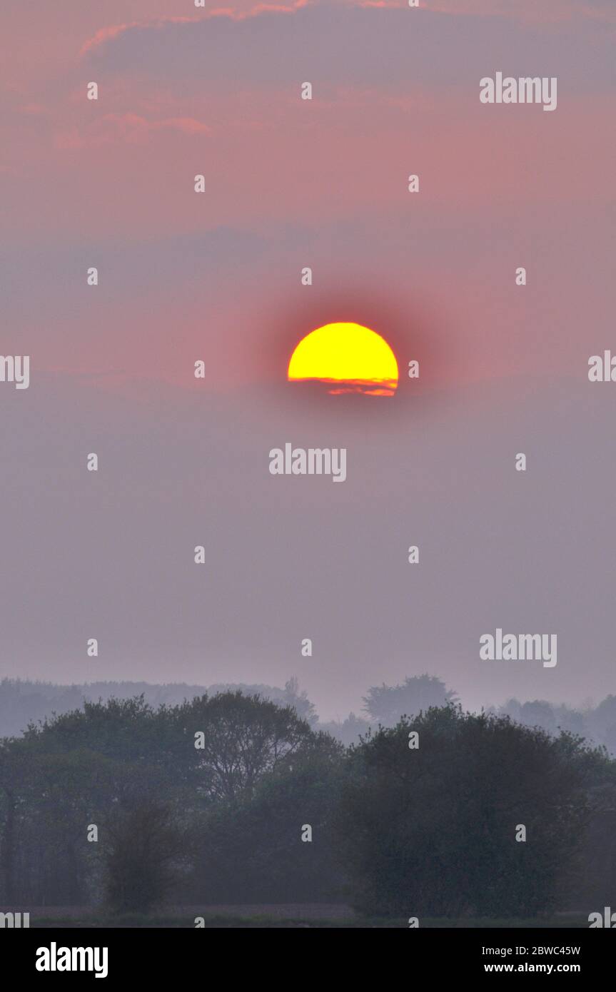 Sunset over the countryside in Brittany Stock Photo - Alamy