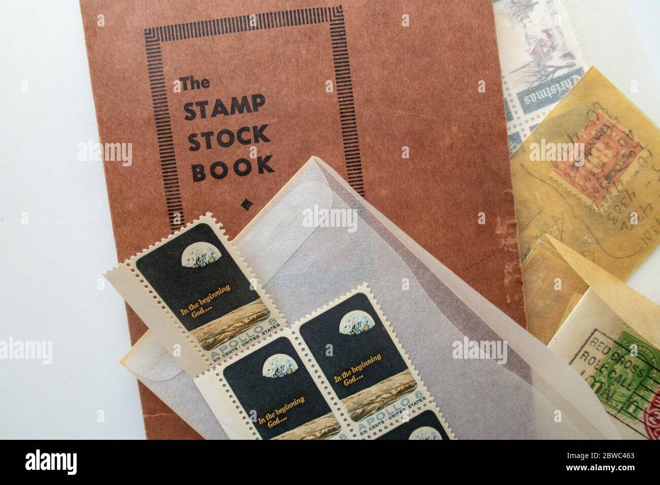 Vintage stamps and a stock book, USA Stock Photo - Alamy
