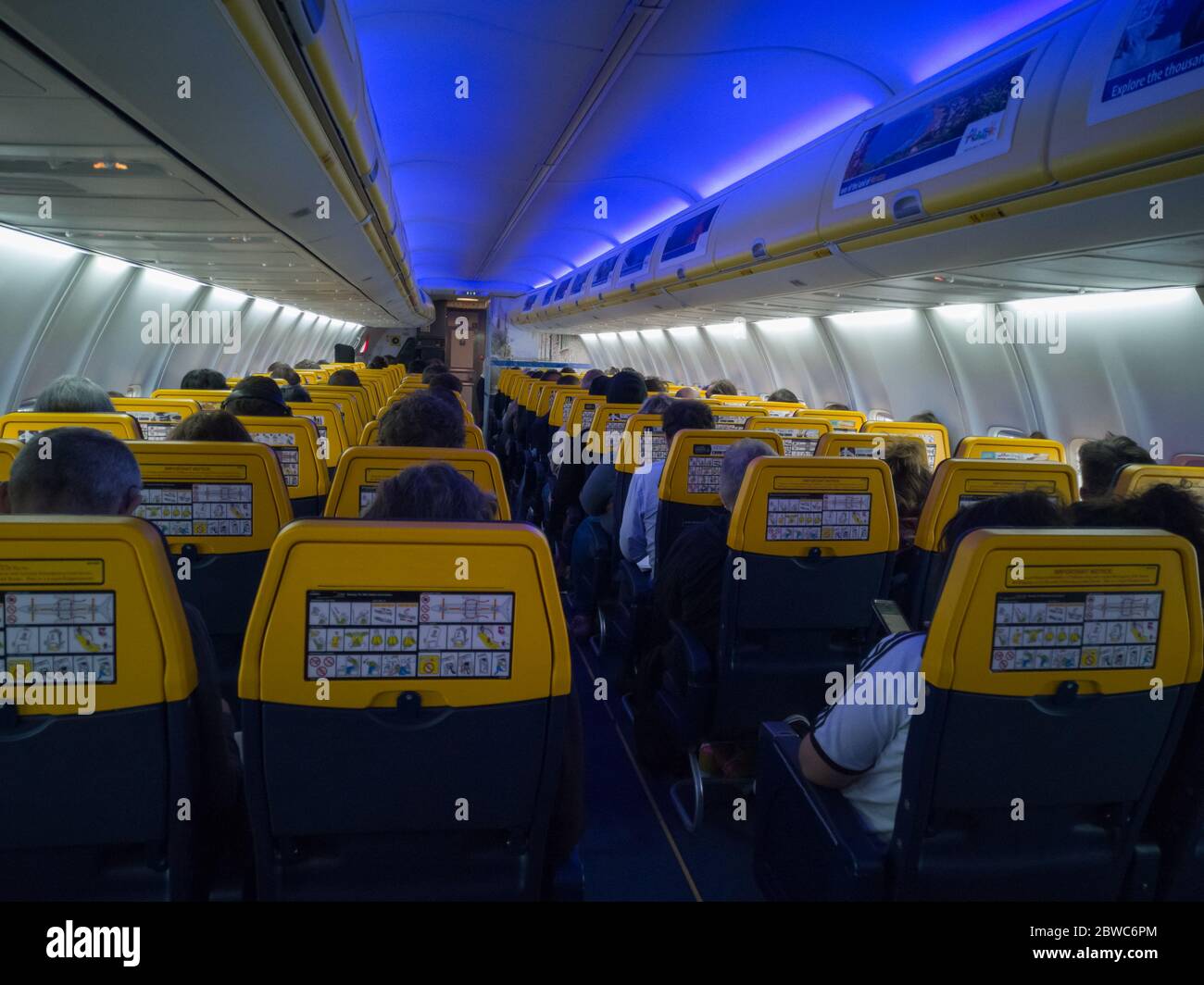 Aircraft Interiors and Cabin full of Passengers during Flight Stock ...