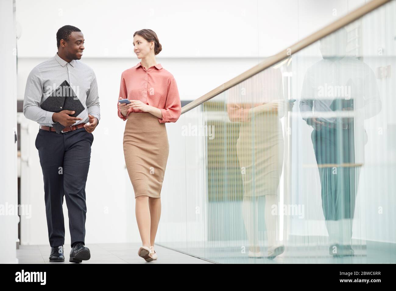 Business person walking towards camera hi-res stock photography and ...