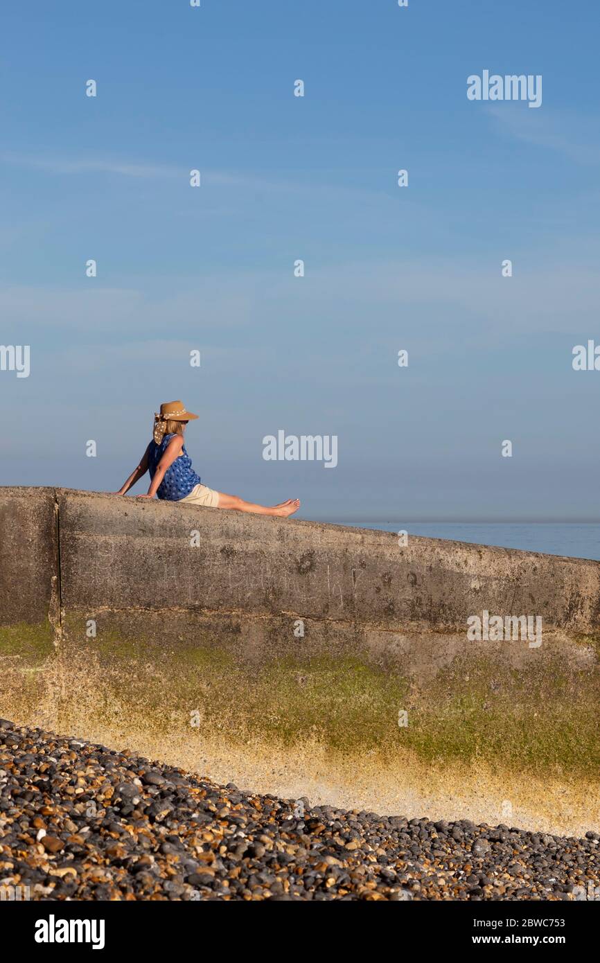 Woman sun bathing hi-res stock photography and images - Alamy