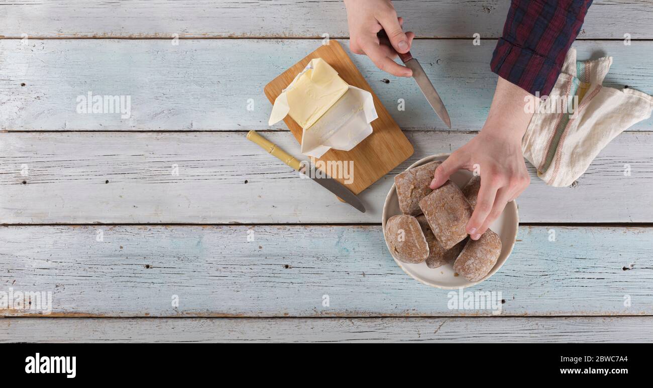 Man buttering bread hi-res stock photography and images - Alamy