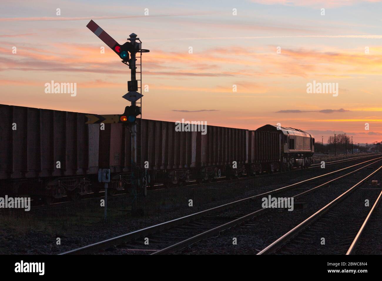 DB Cargo Rail UK class 66 locomotive 66161 hauling a freight train ...