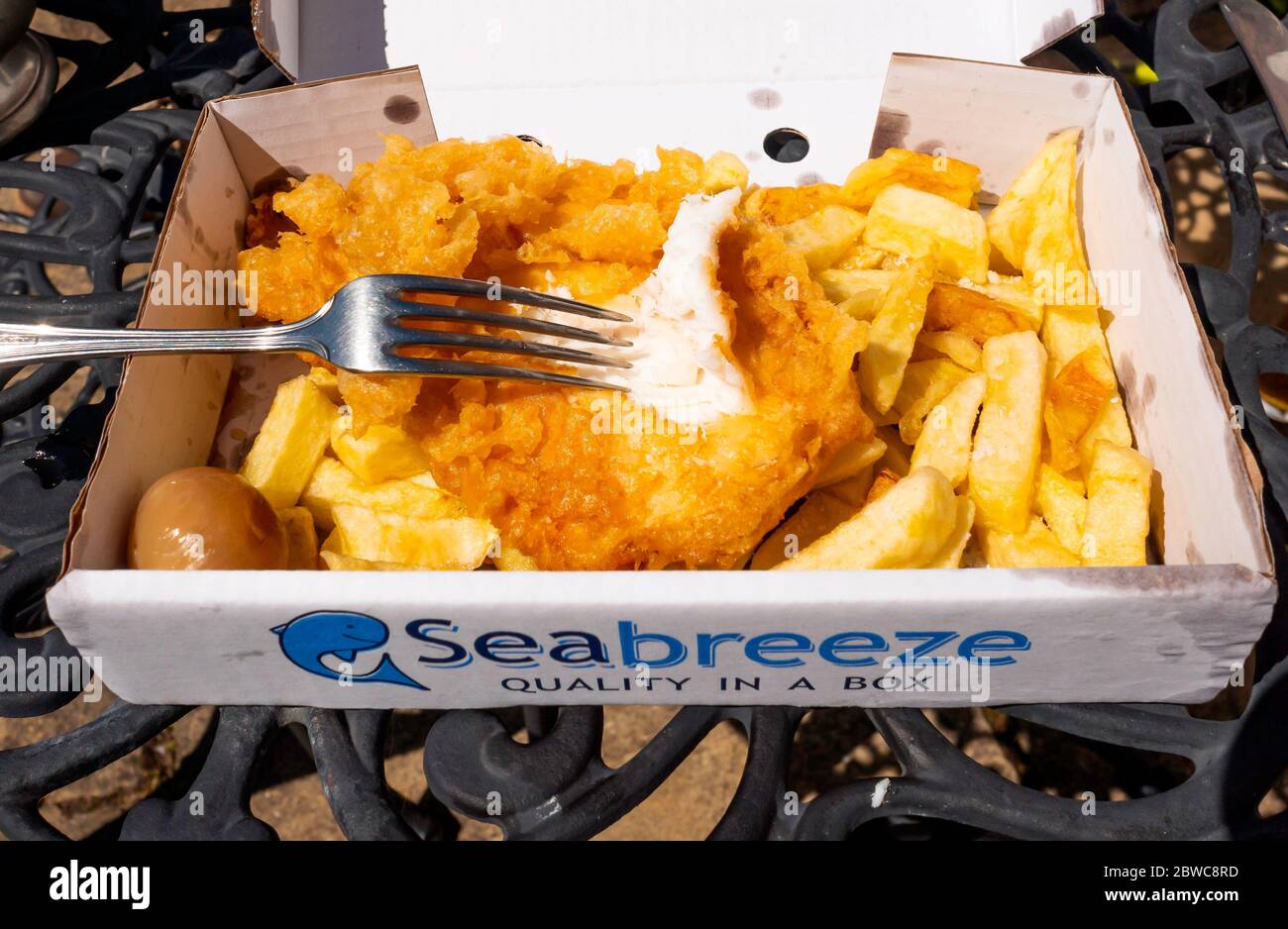 Takeaway, Fish and Chips served in a Seabreeze brand cardboard box, on ...