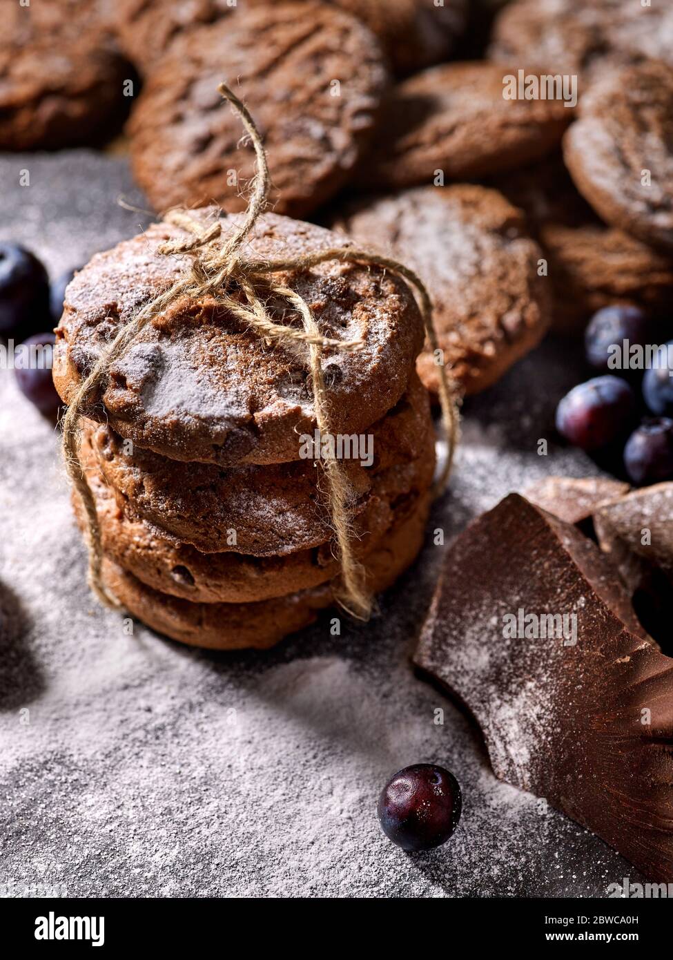 Chocolate chip cookies tied with string on shop window display Stock ...