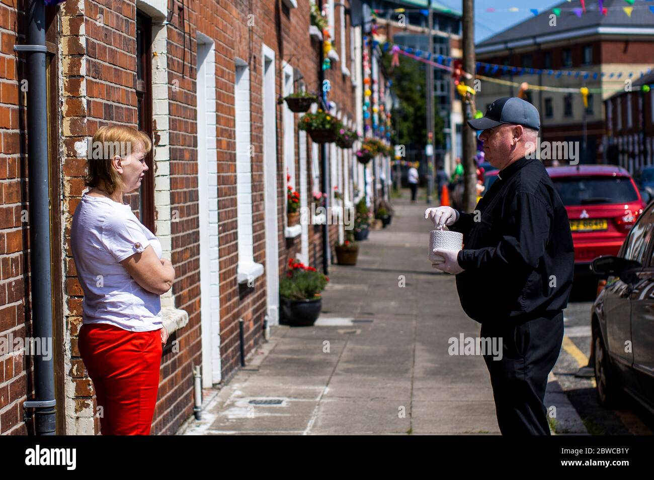 Deacon Gregory McGuigan of St Mary's Church in Belfast offering a ...