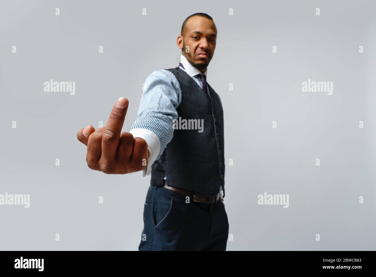 professional african-american business man - showing middle finger ...