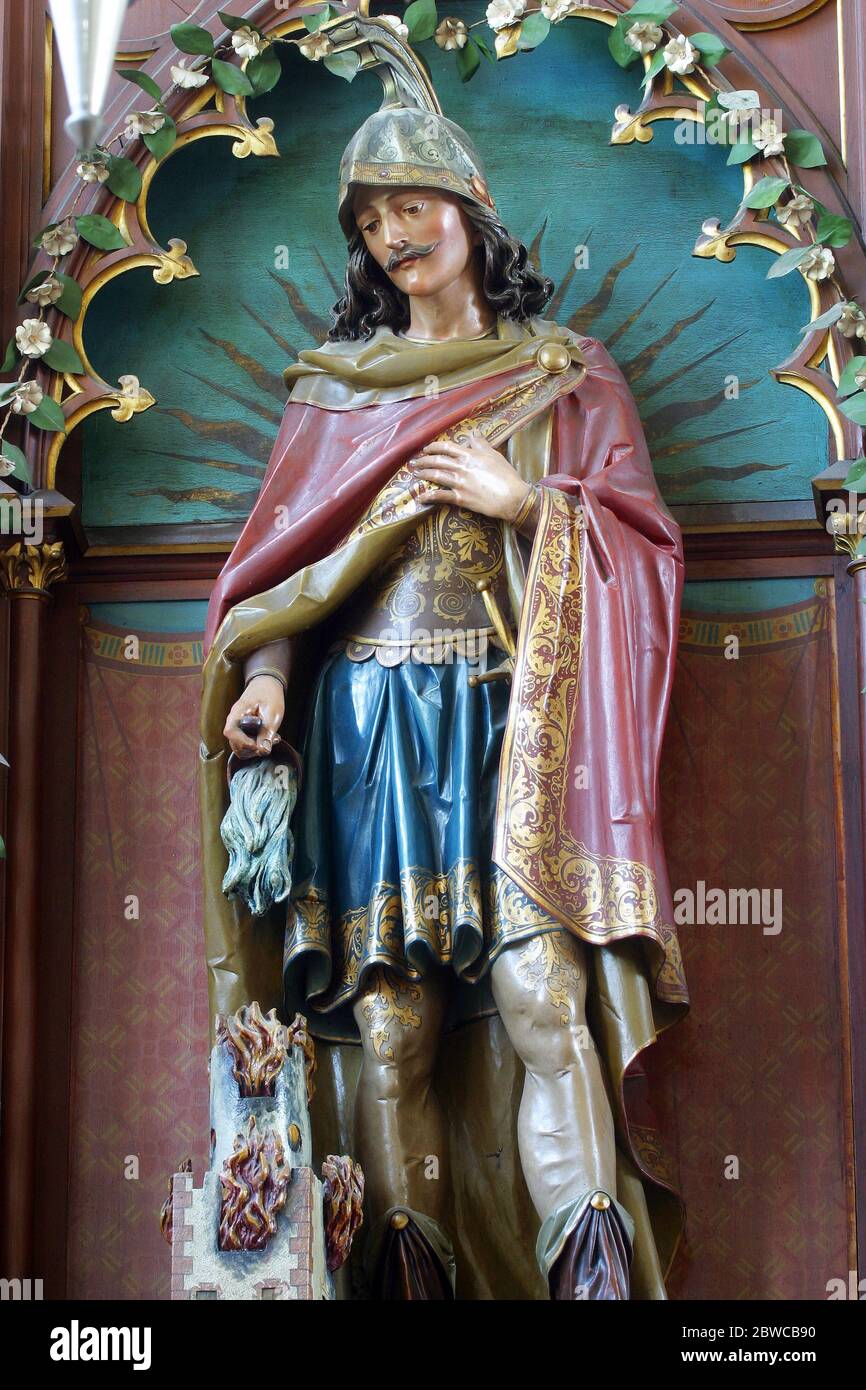 Saint Florian statue on the altar Saint Florian in the parish church of ...