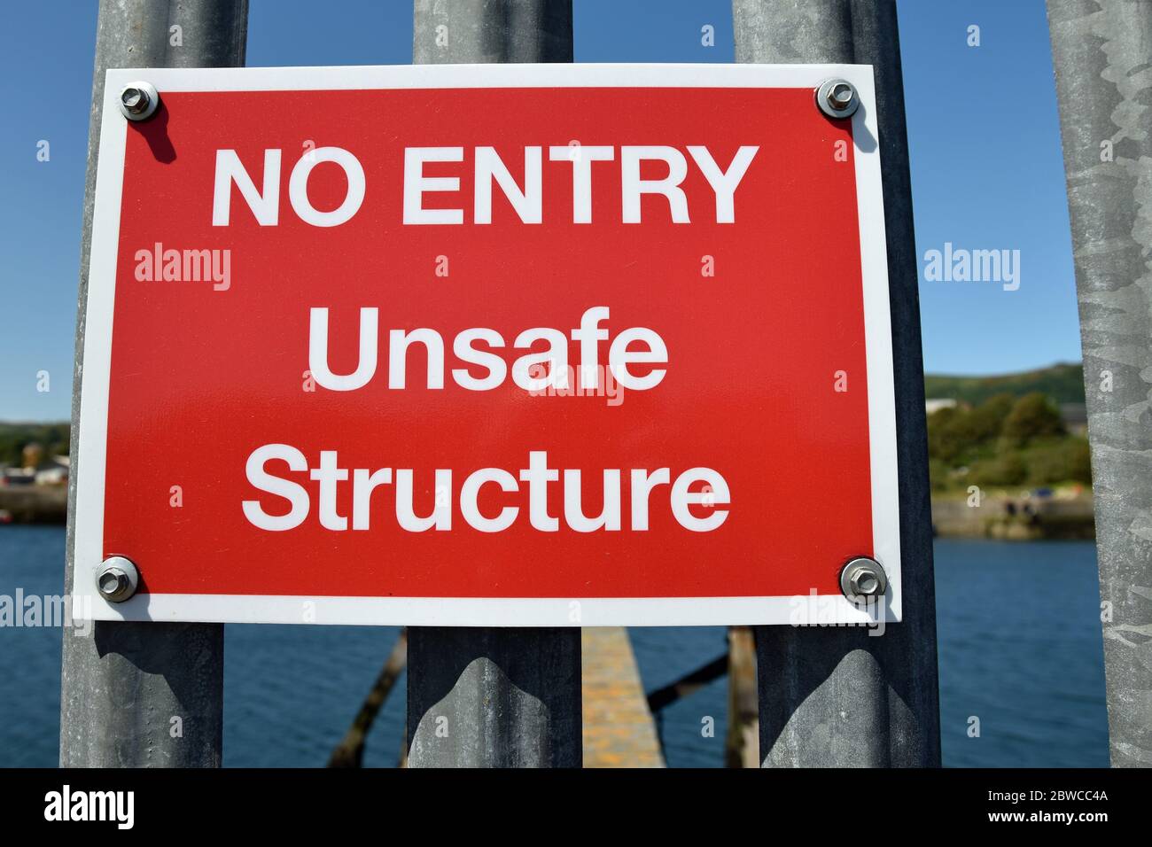 Rectangular red and white sign - no entry unsafe structure - on metal ...