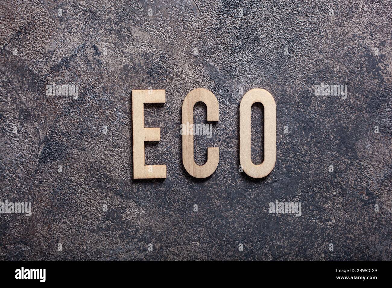 eco word text wooden letters on gray concrete background Stock Photo ...