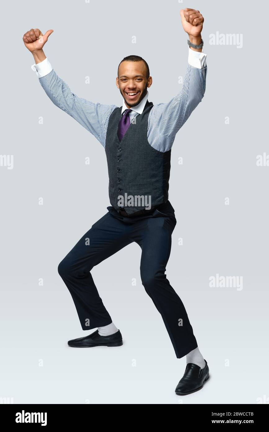 African-American man face portrait over grey background Stock Photo - Alamy