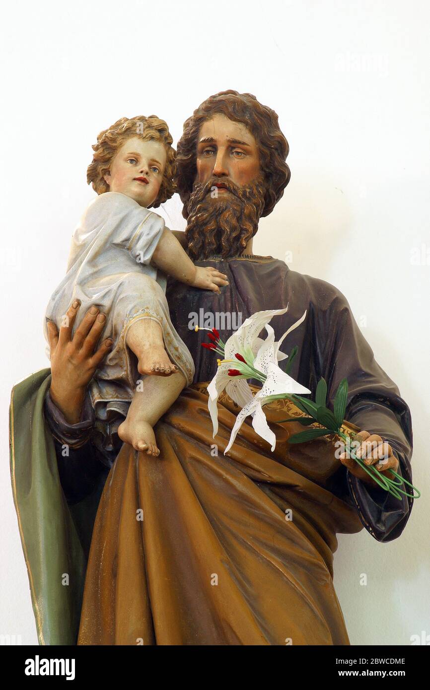 Saint michael holds hi-res stock photography and images - Alamy