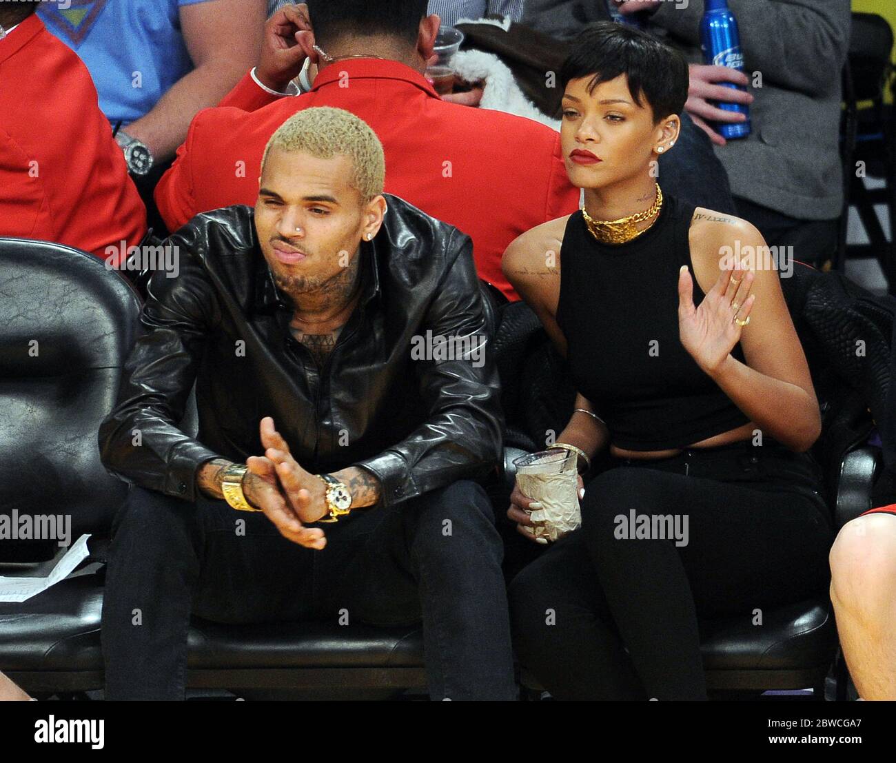 Rihanna, Chris Brown laughing together at LA Lakers NBA game, December ...
