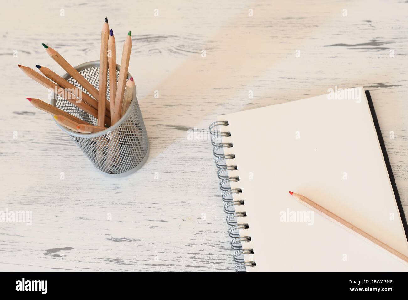 Red color ready to draw over a white notebook page Stock Photo - Alamy