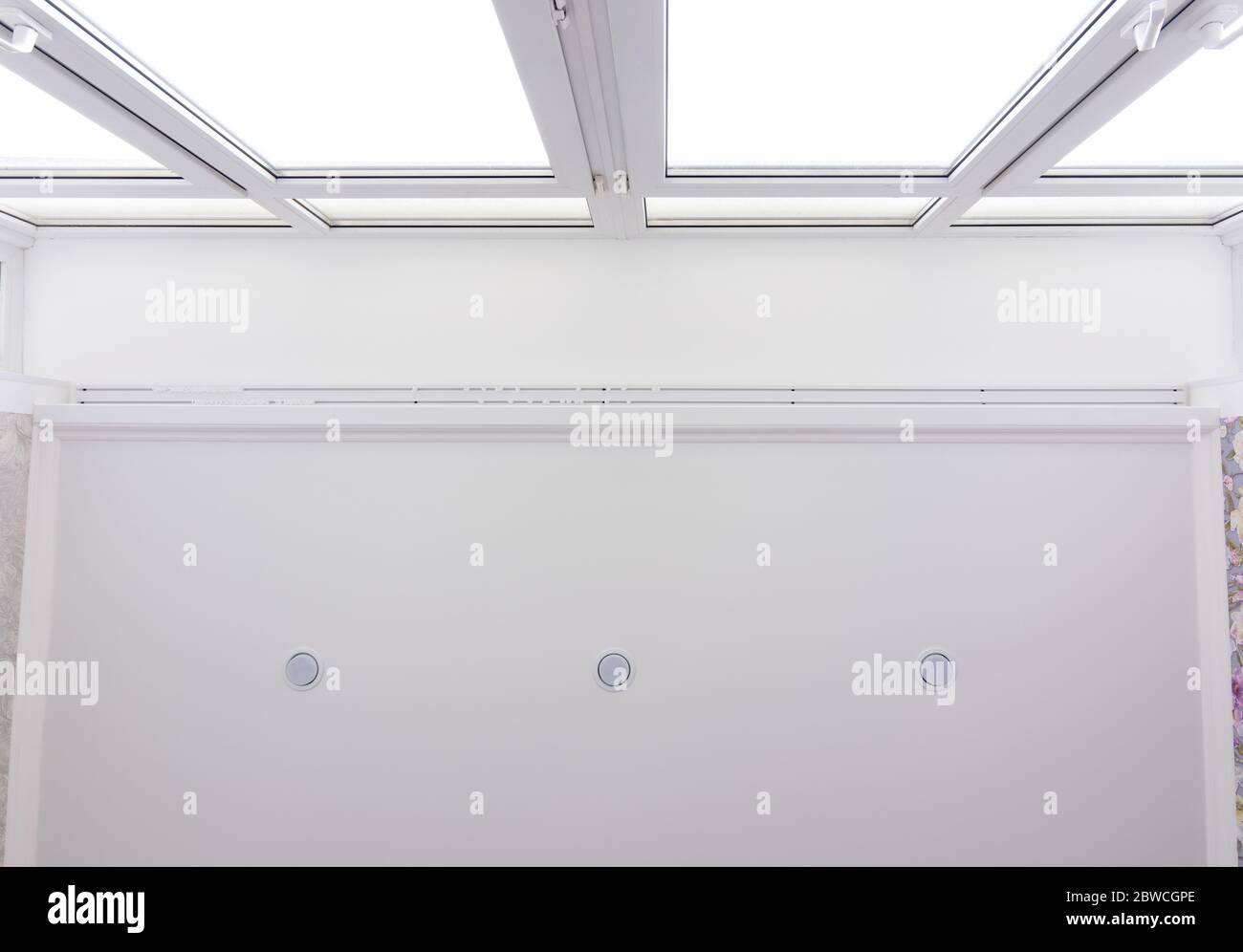 Contact of a stretch ceiling to a wide stained-glass window Stock Photo ...