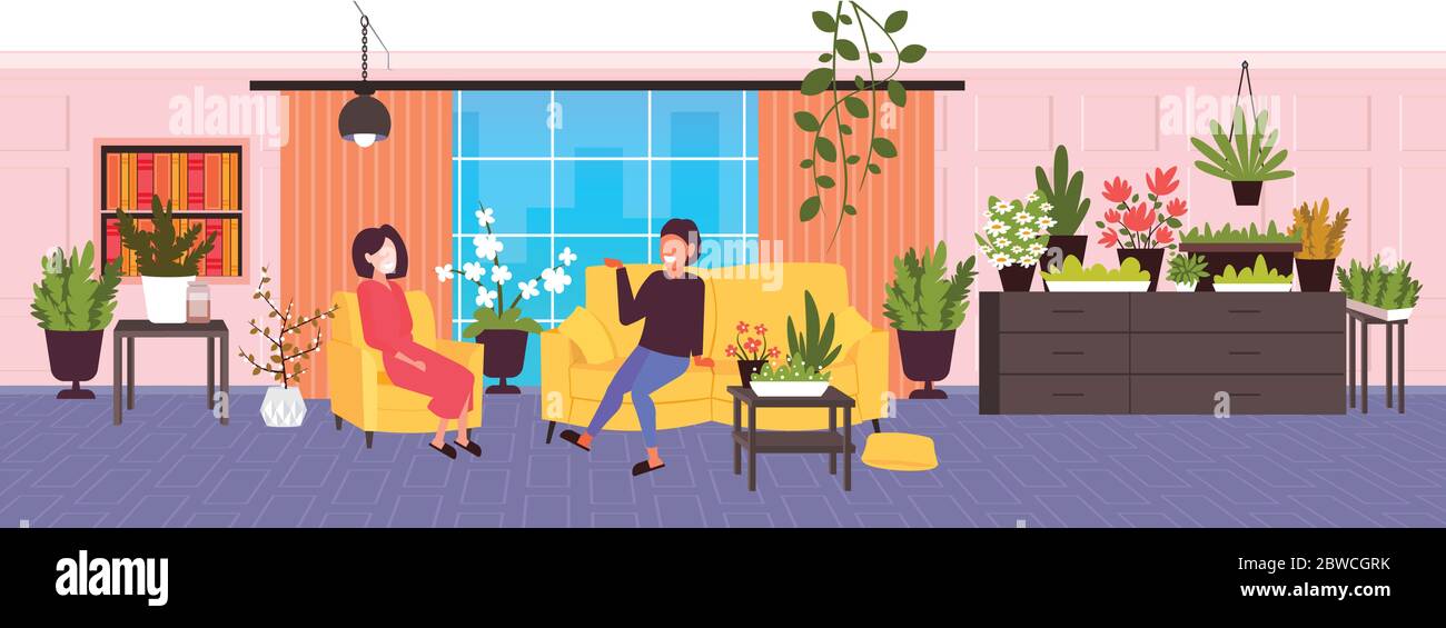 girls discussing during meeting women relaxing in modern living room ...