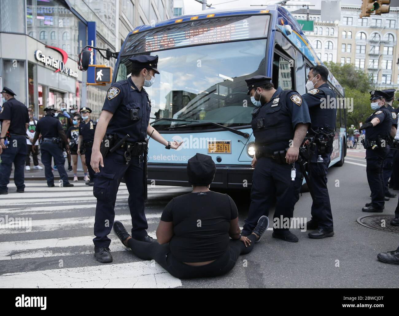 Nypd police officers surround hi-res stock photography and images - Alamy