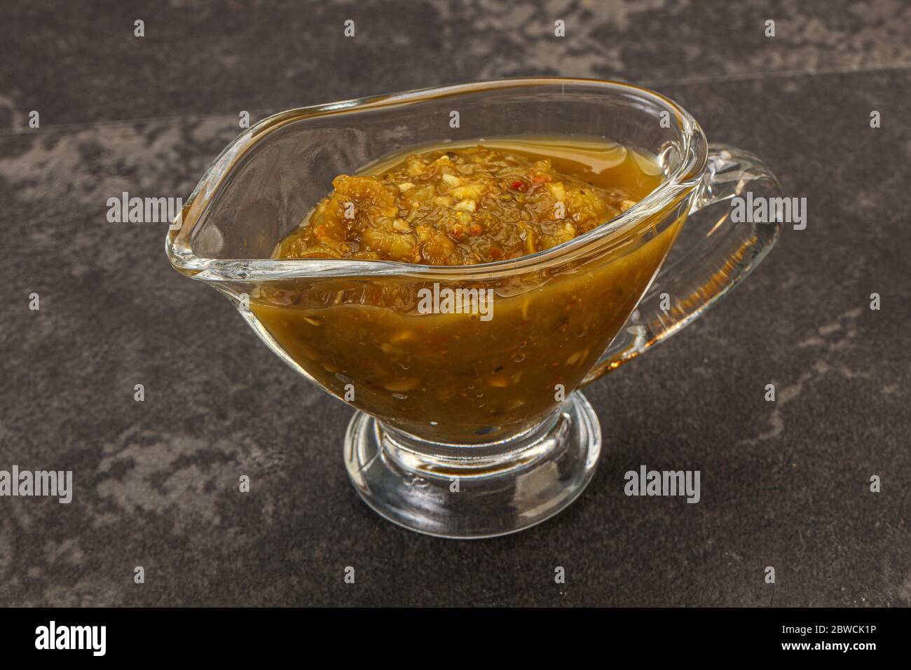 Green spicy sauce with pepper in the bowl Stock Photo - Alamy