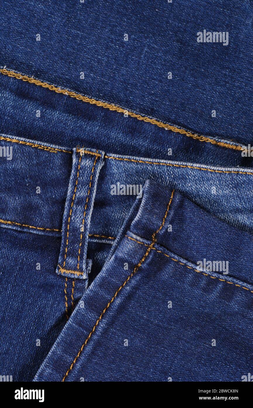 Weave and stitching. The world classics of blue jeans Stock Photo - Alamy