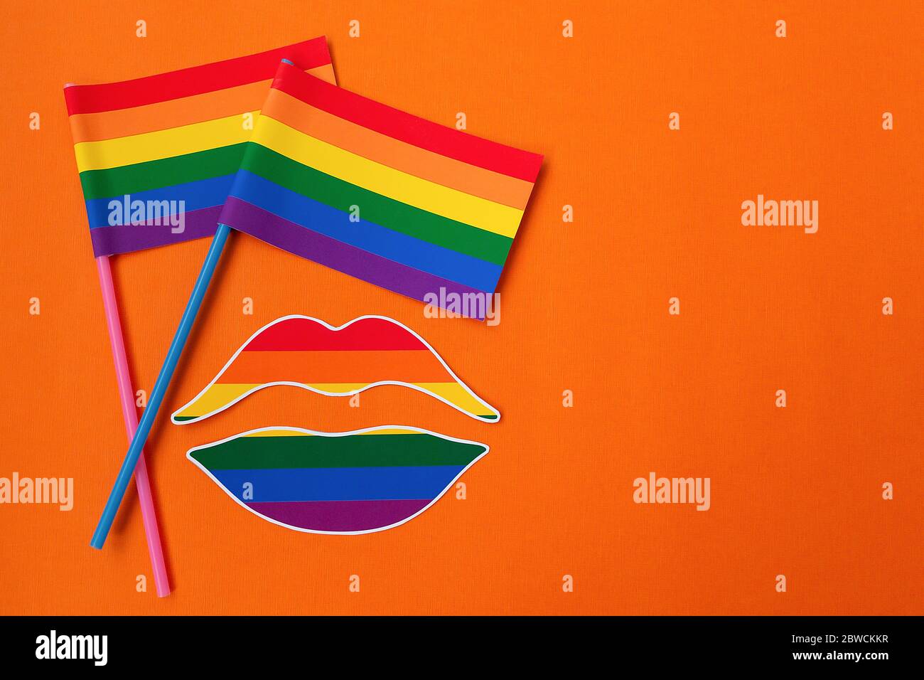 the lgbt symbol made of paper on an orange background Stock Photo - Alamy