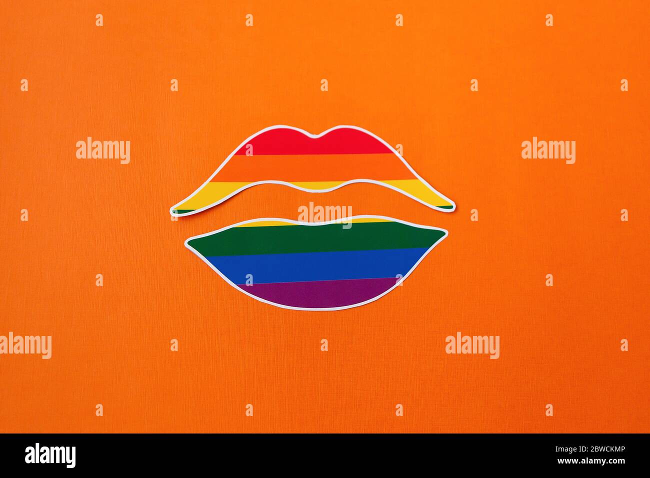 the lgbt symbol made of paper on an orange background Stock Photo - Alamy