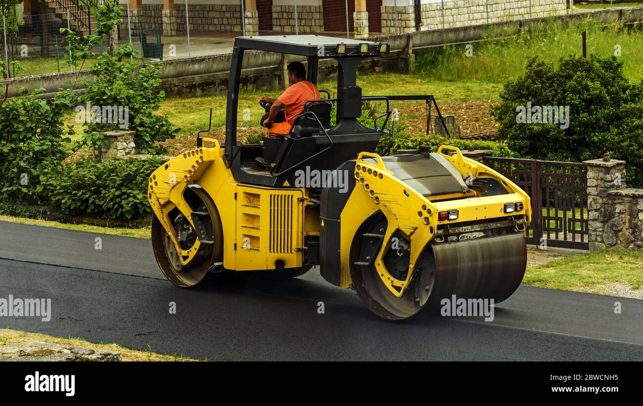 Compactor type engineering vehicle hi-res stock photography and images ...
