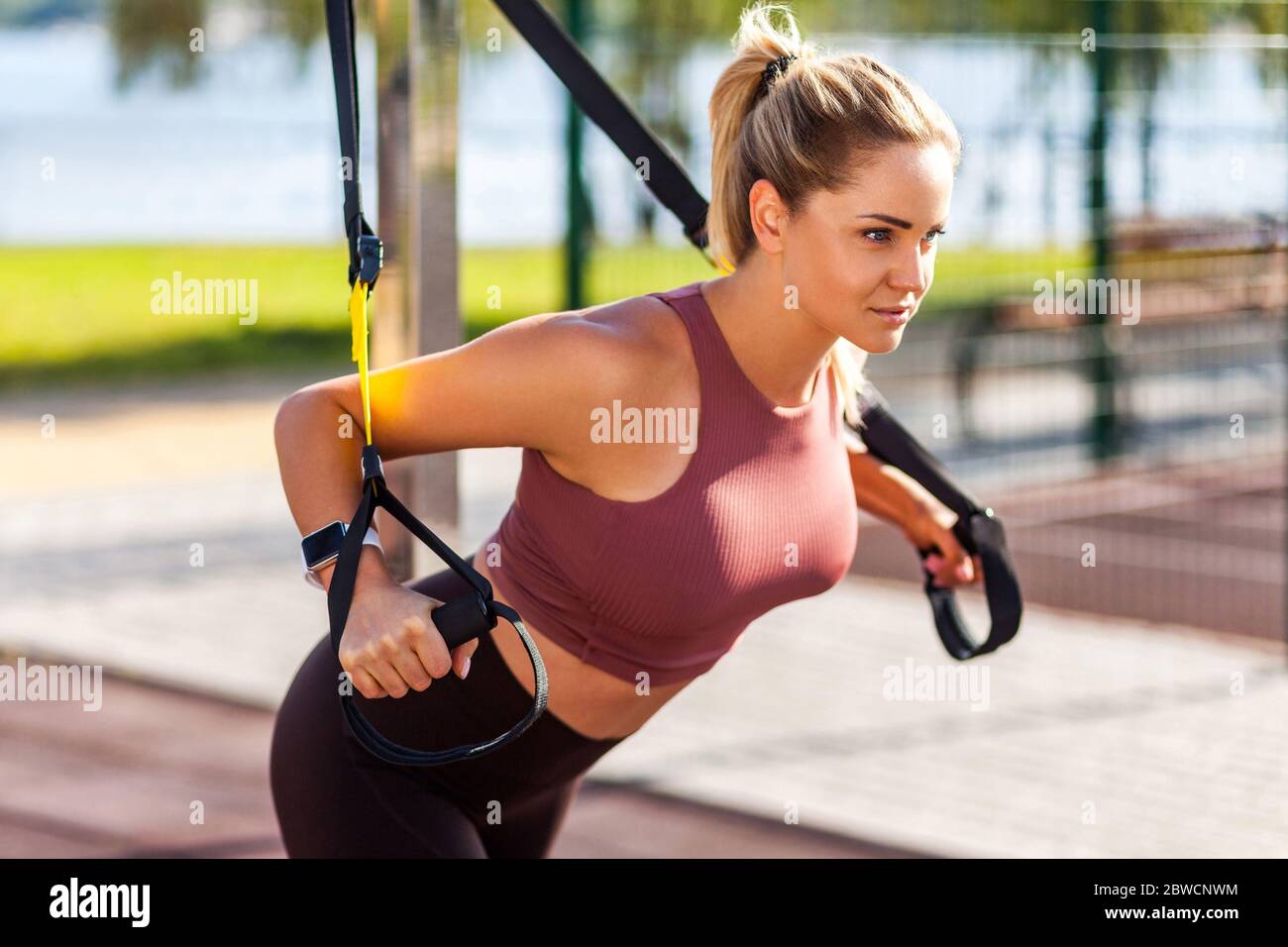 Sports activity closeup. Beautiful athletic woman training outdoor ...