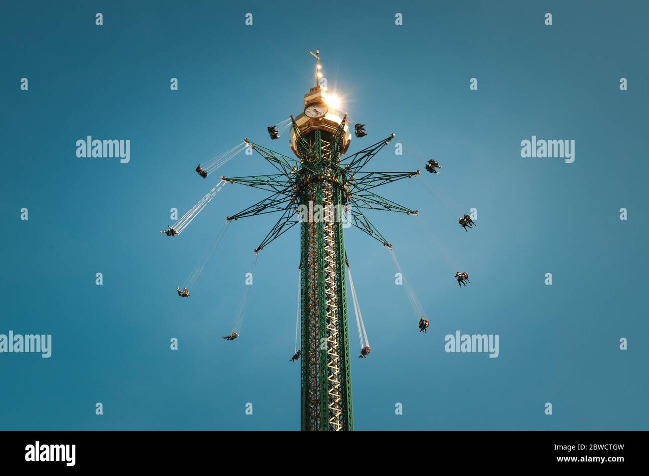 Flying chain carousel over the skies of Vienna Stock Photo - Alamy