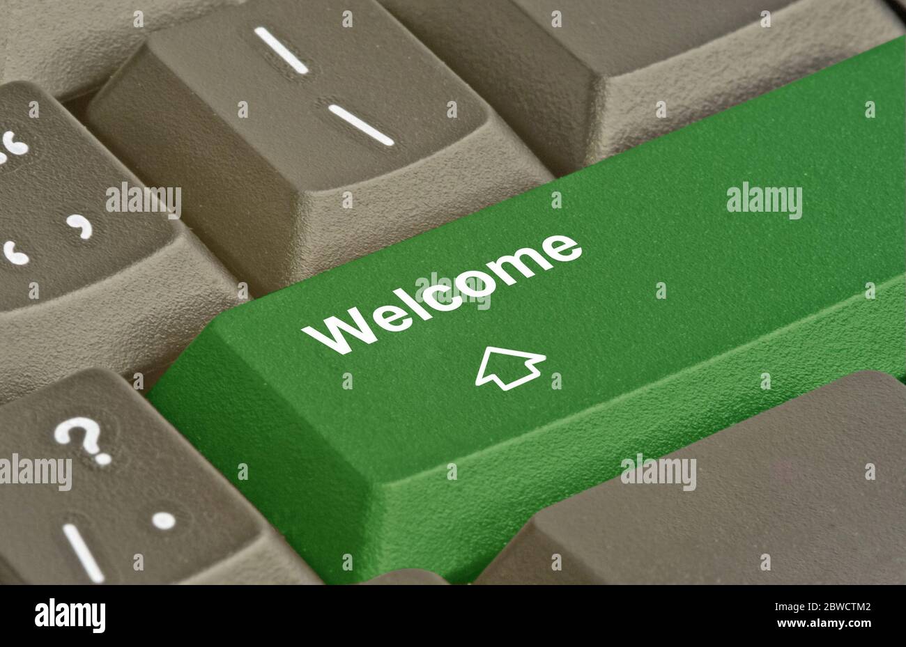 Keyboard with key for welcome Stock Photo - Alamy