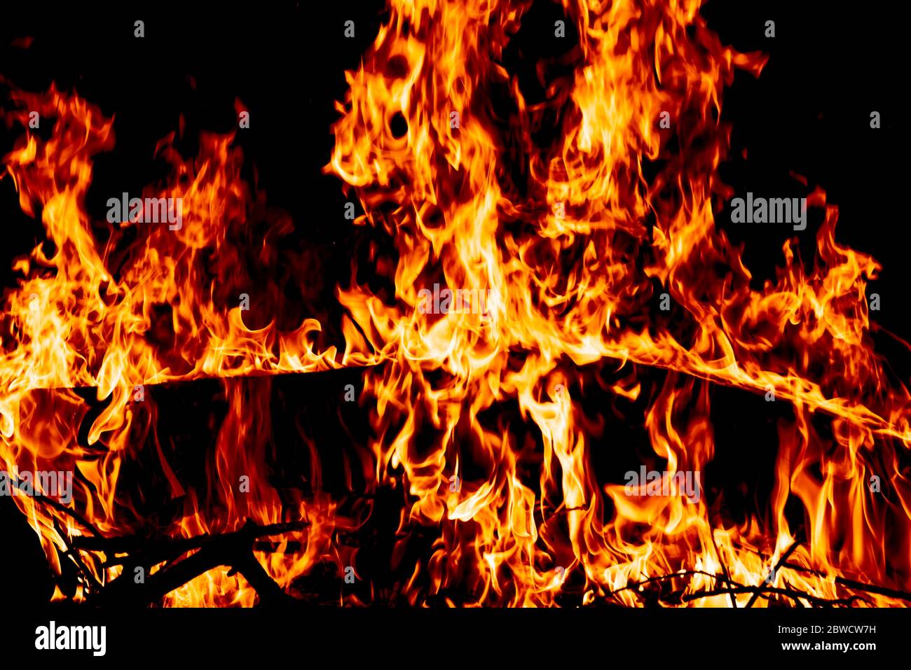 Wood fire on black background.Fire on a dark background. Background ...