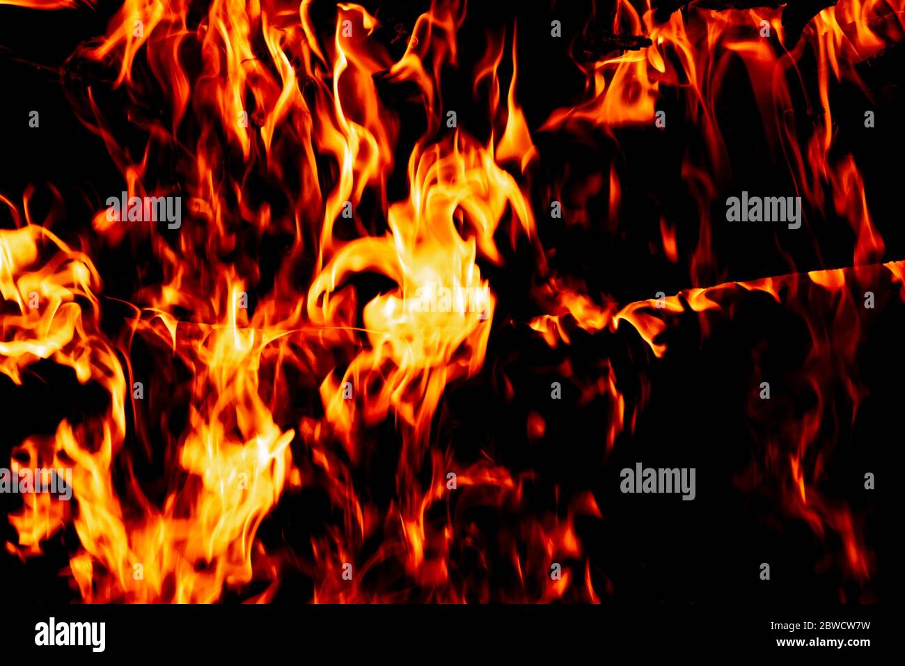 Wood fire on black background.Fire on a dark background. Background ...