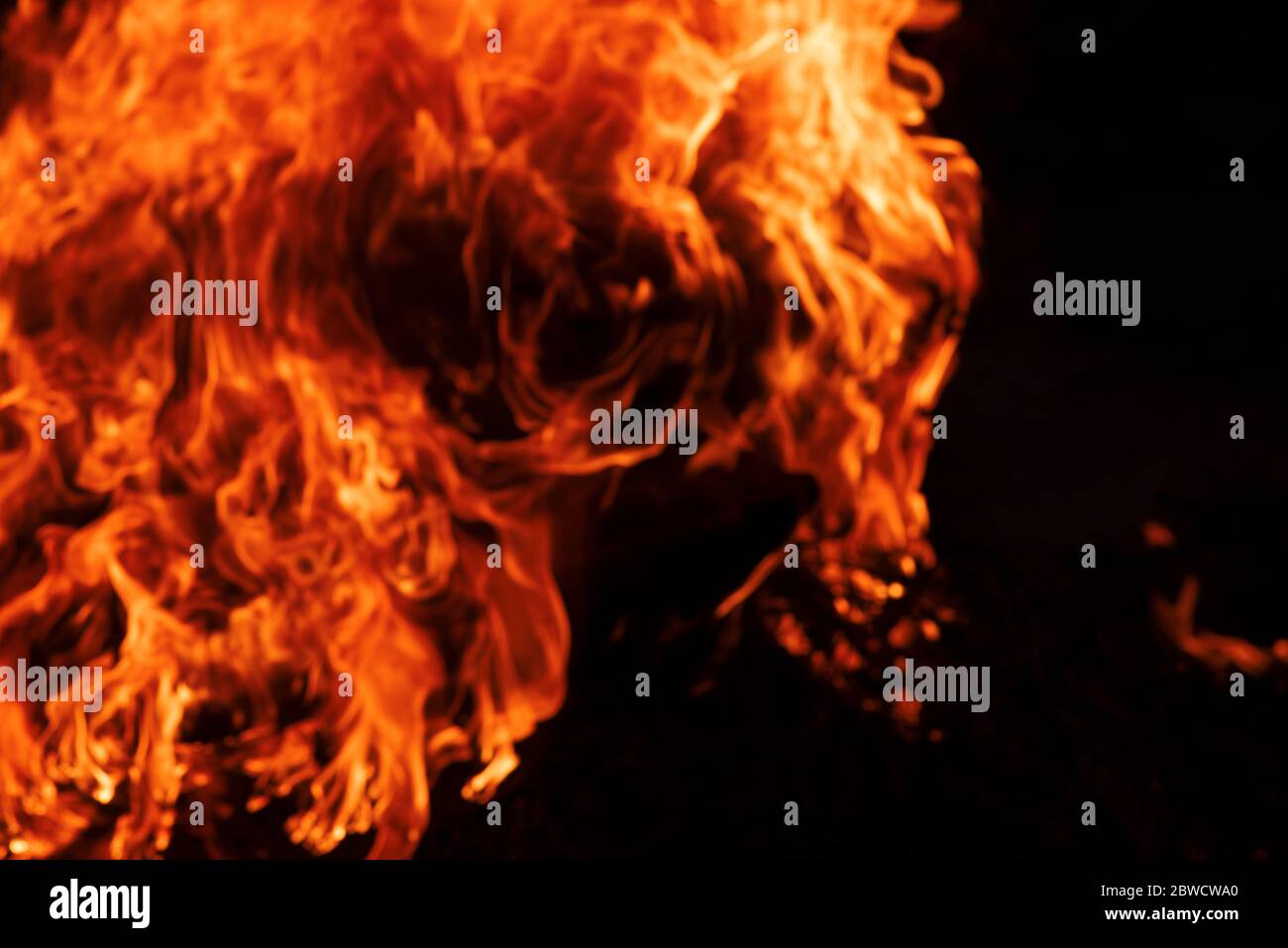 Wood fire on black background.Fire on a dark background. Background ...