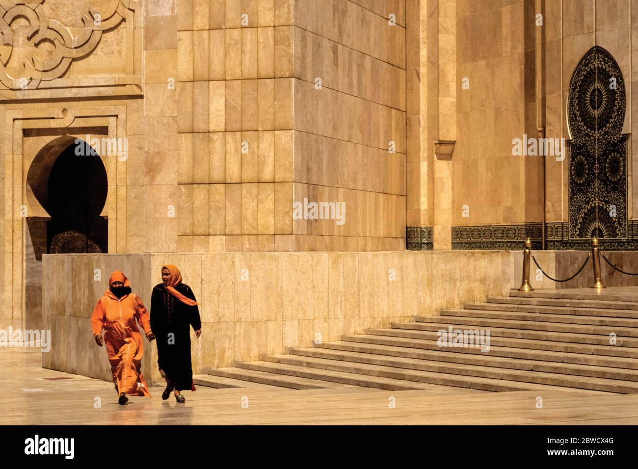 Women dressed in traditional clothes in a mosque at Casablanca, in ...