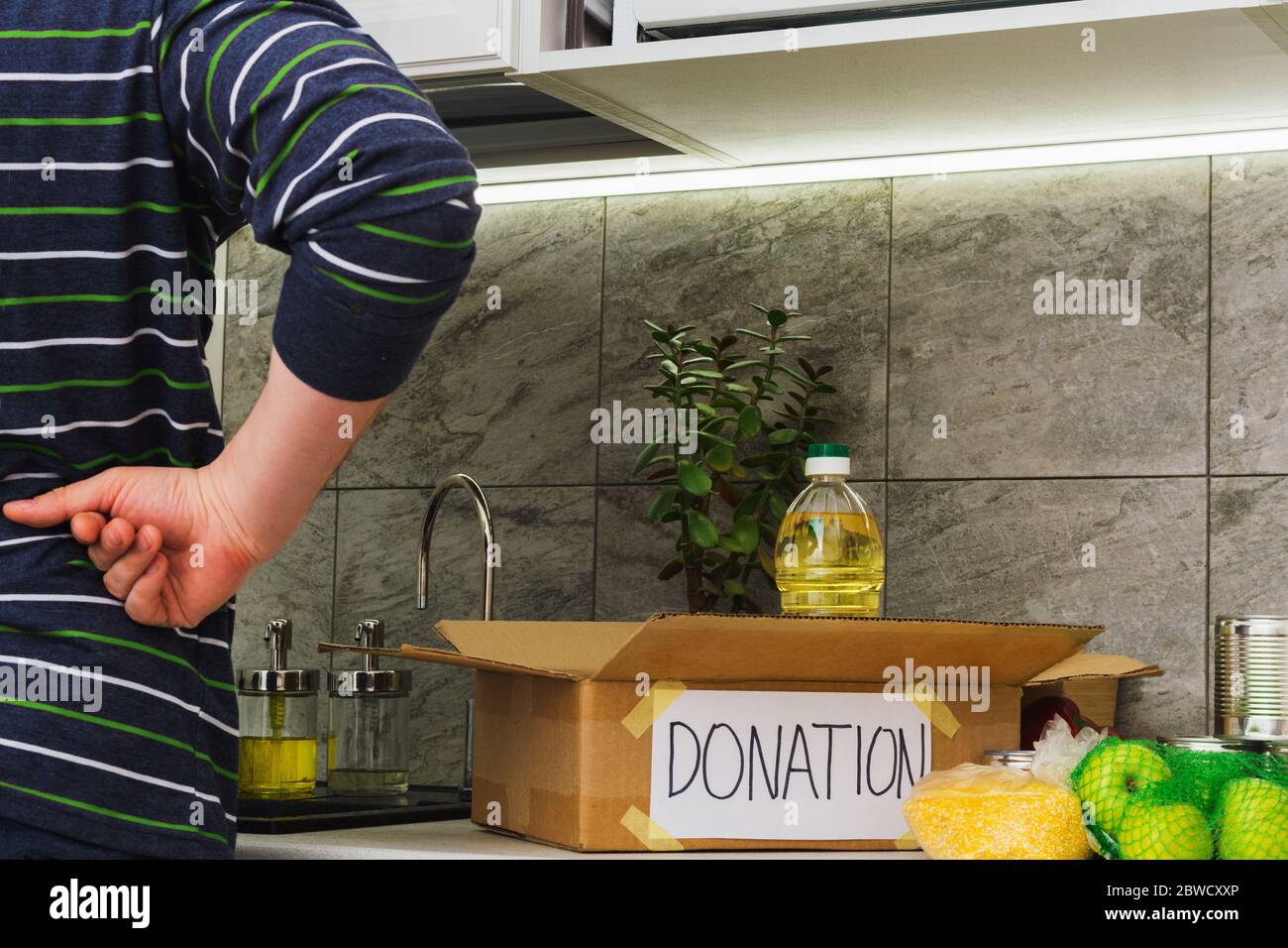 Man giving charity hi-res stock photography and images - Alamy