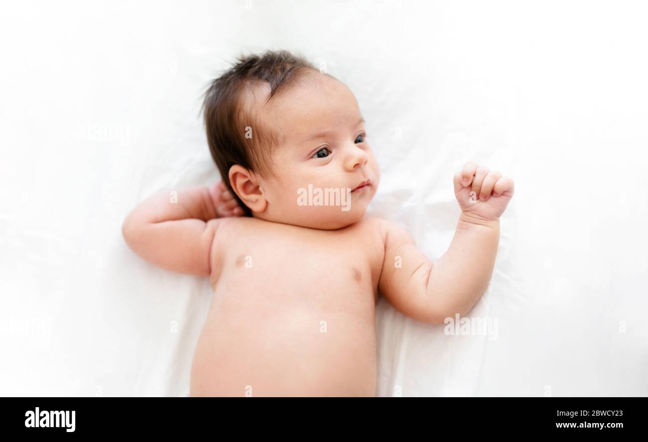 Close-up of a doctor checking weight of cute little baby. Healthcare ...