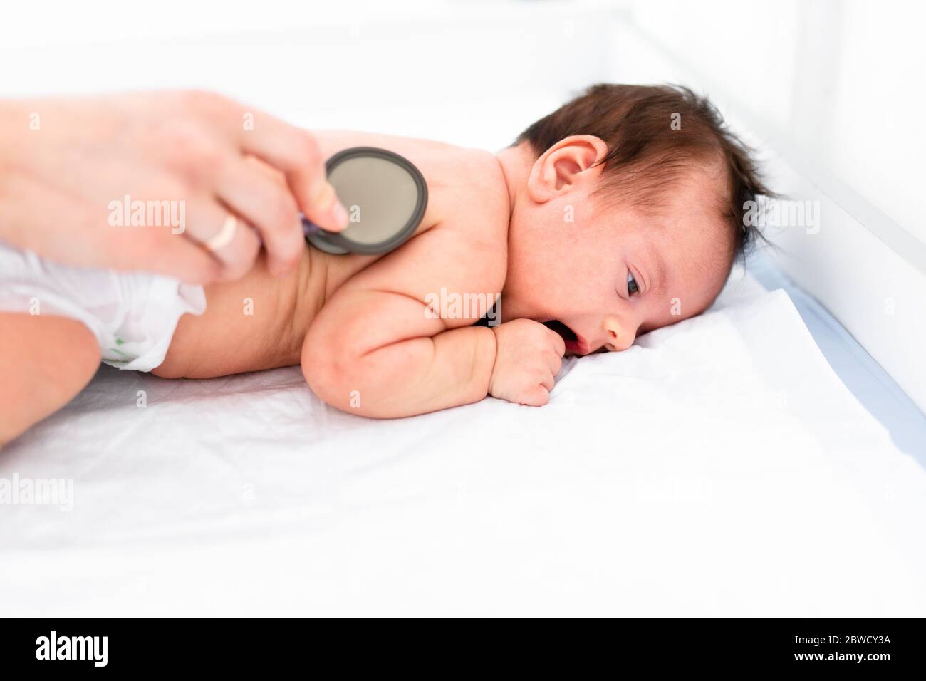 Girl using stethoscope listen chest hi-res stock photography and images ...