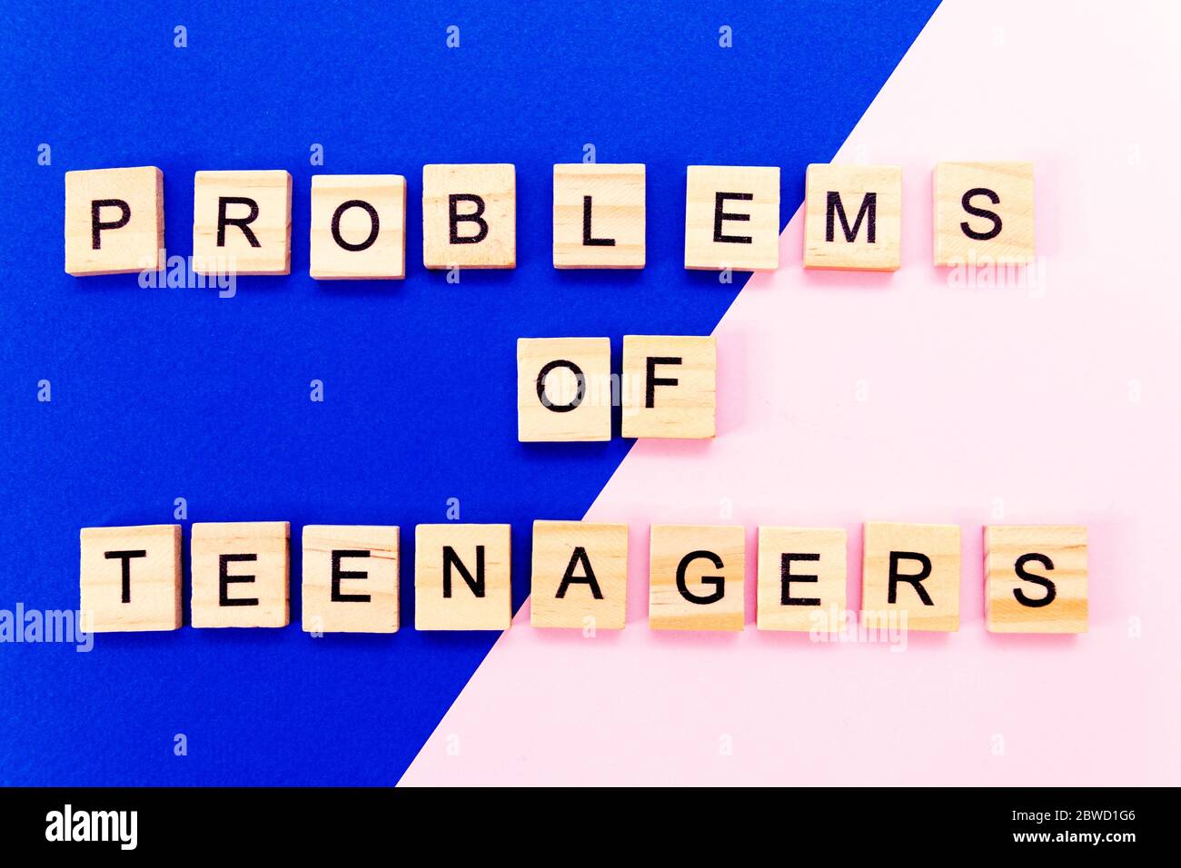 Words problems of teenagers. Wooden blocks with an inscription on top ...
