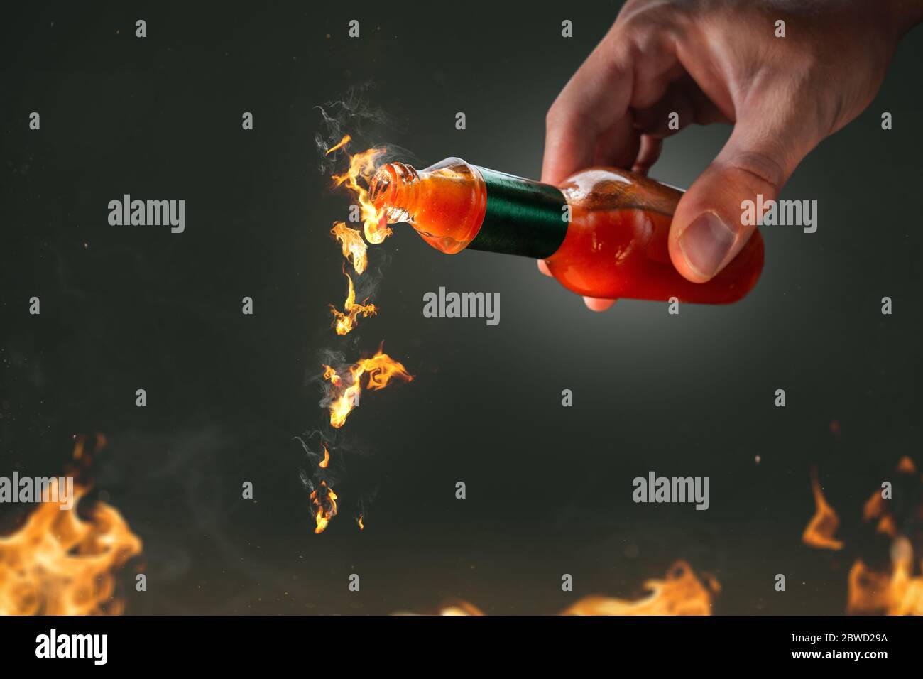 Hand pouring sauce hi-res stock photography and images - Alamy