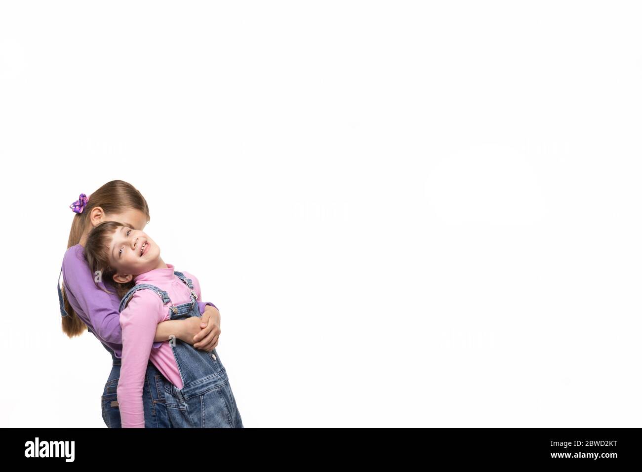 One girl fell back on another girl, she caught her and supports Stock ...