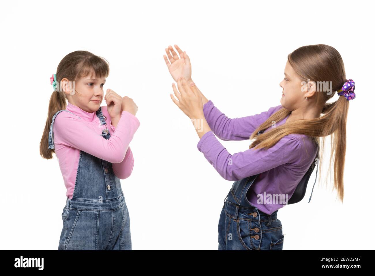 The sisters got mad at each other and started a fight Stock Photo - Alamy