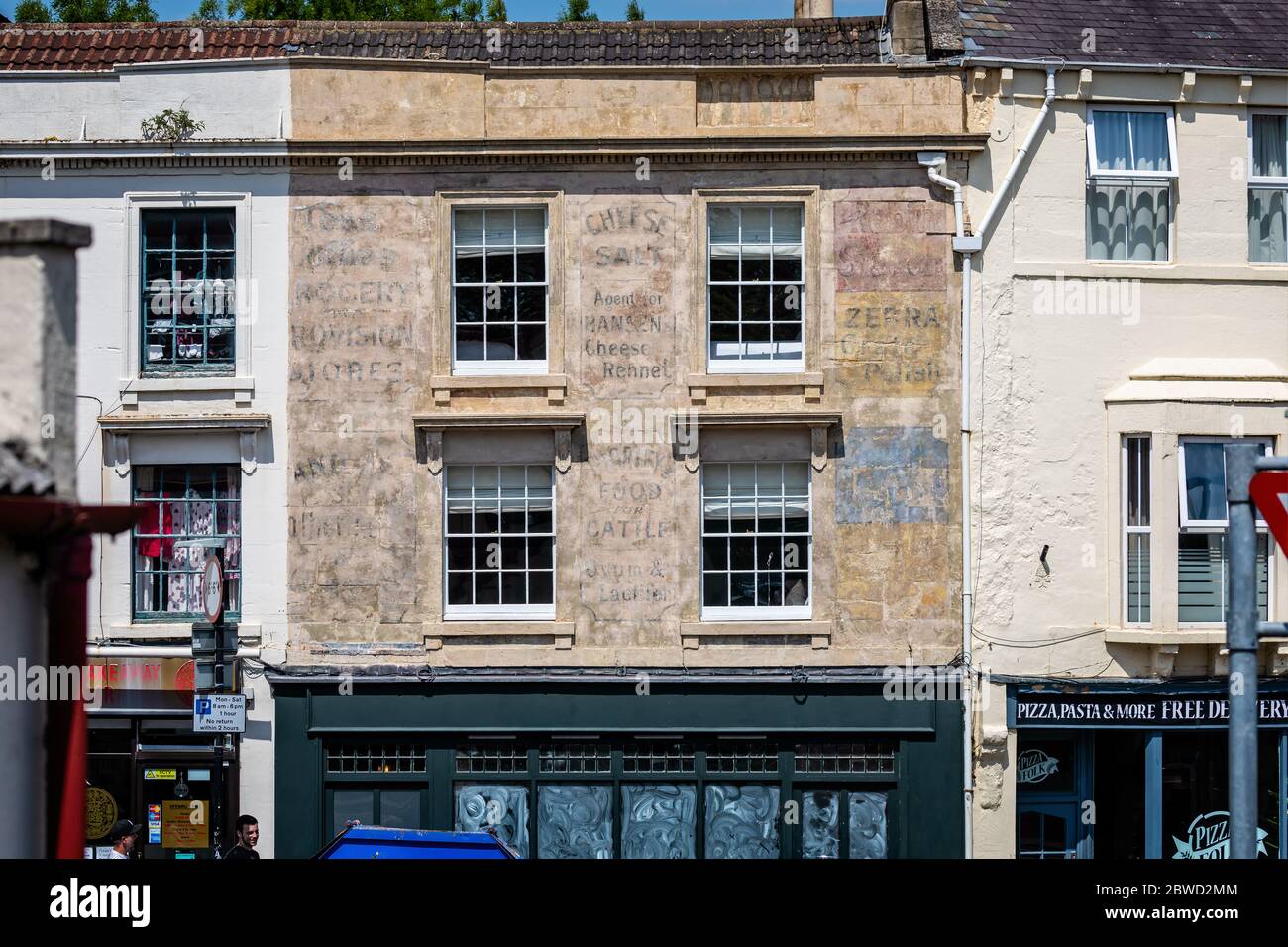 Vintage faded retail advertising signs from the early 1900's painted on ...