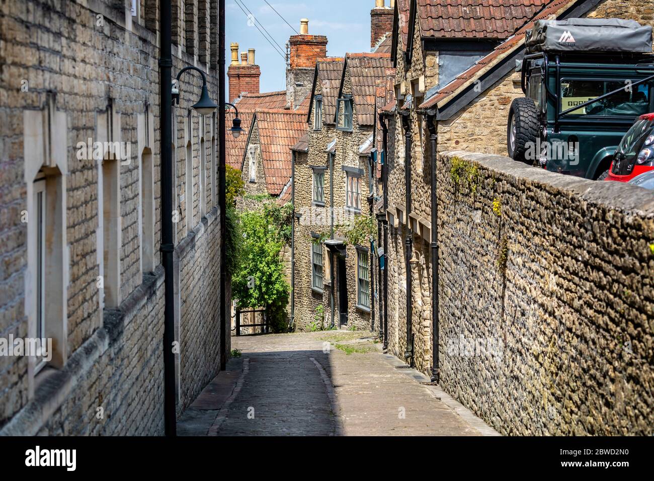View looking down from the top of medieval cobbled Gentle Street in ...